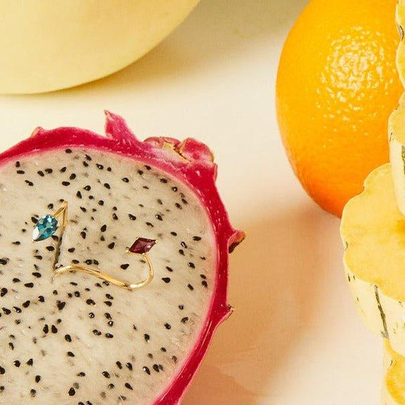 LÚDERE gold open band ring with London blue topaz pear and rhodolite ...