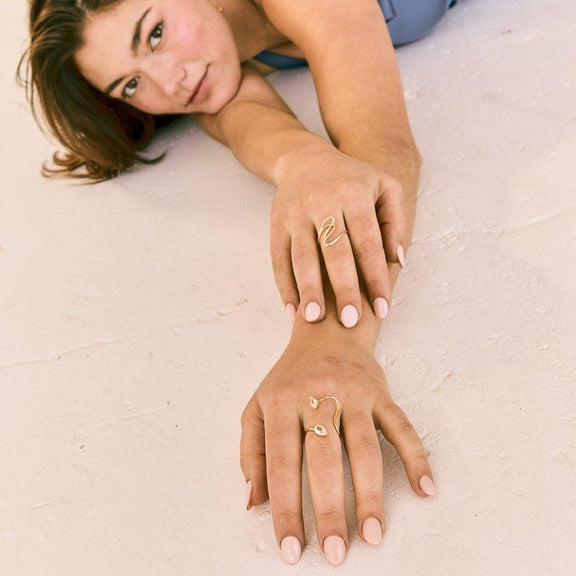 LÚDERE gold open band ring with London blue topaz pear and rhodolite ...